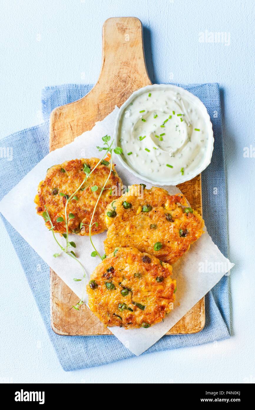 Vegetable rosti with herb dip Stock Photo - Alamy