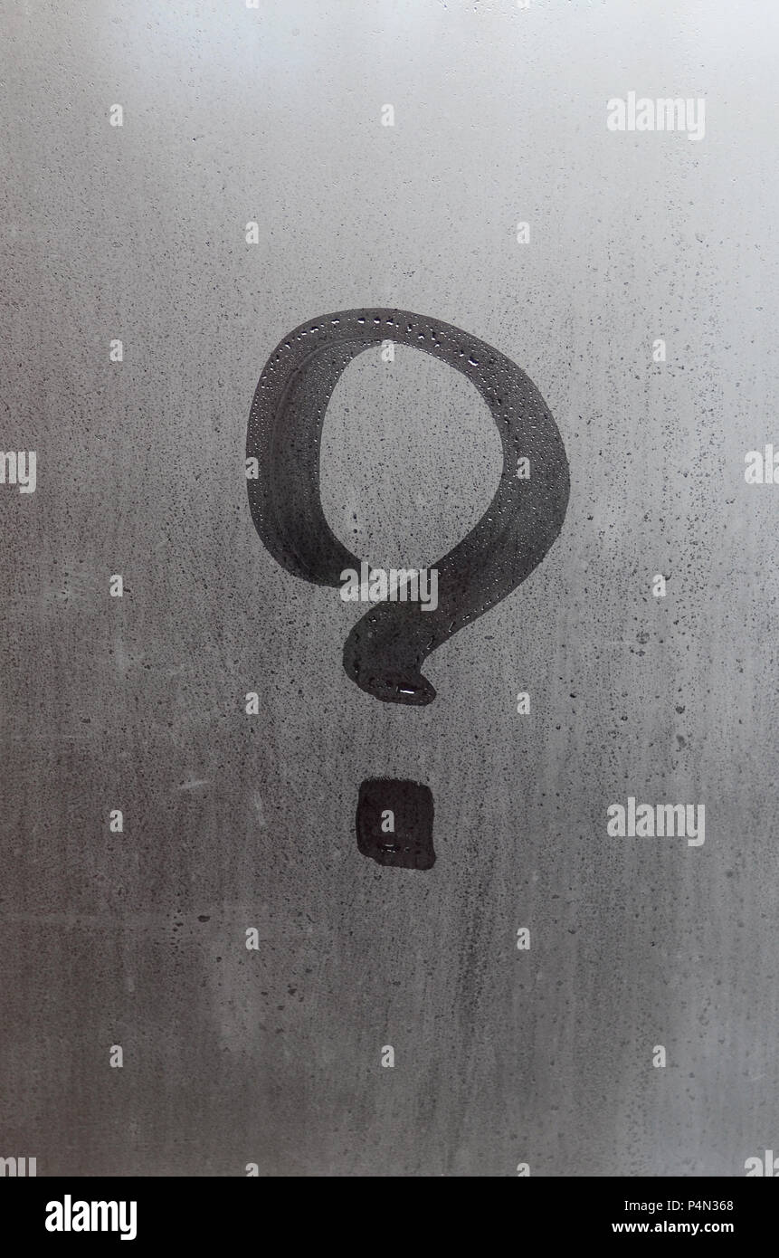 The inscription on glass, question mark concept. Question sign is ...