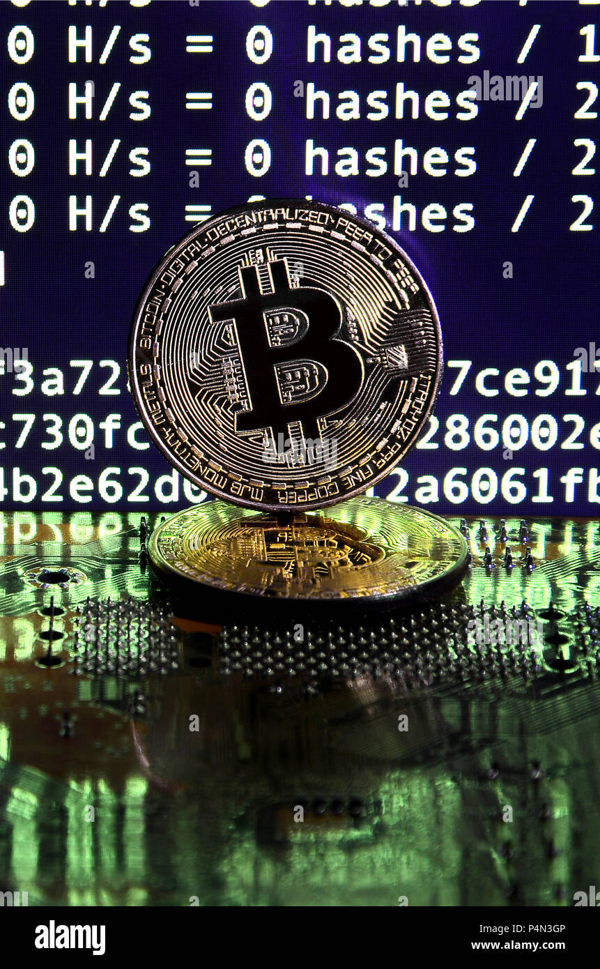 Bitcoin on binary code screen transfer hi-res stock photography and ...