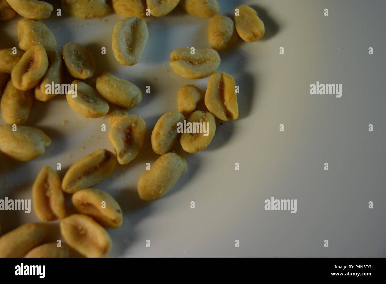 Healthy foods, health, nuts, salted toasted peanuts are arranged ...