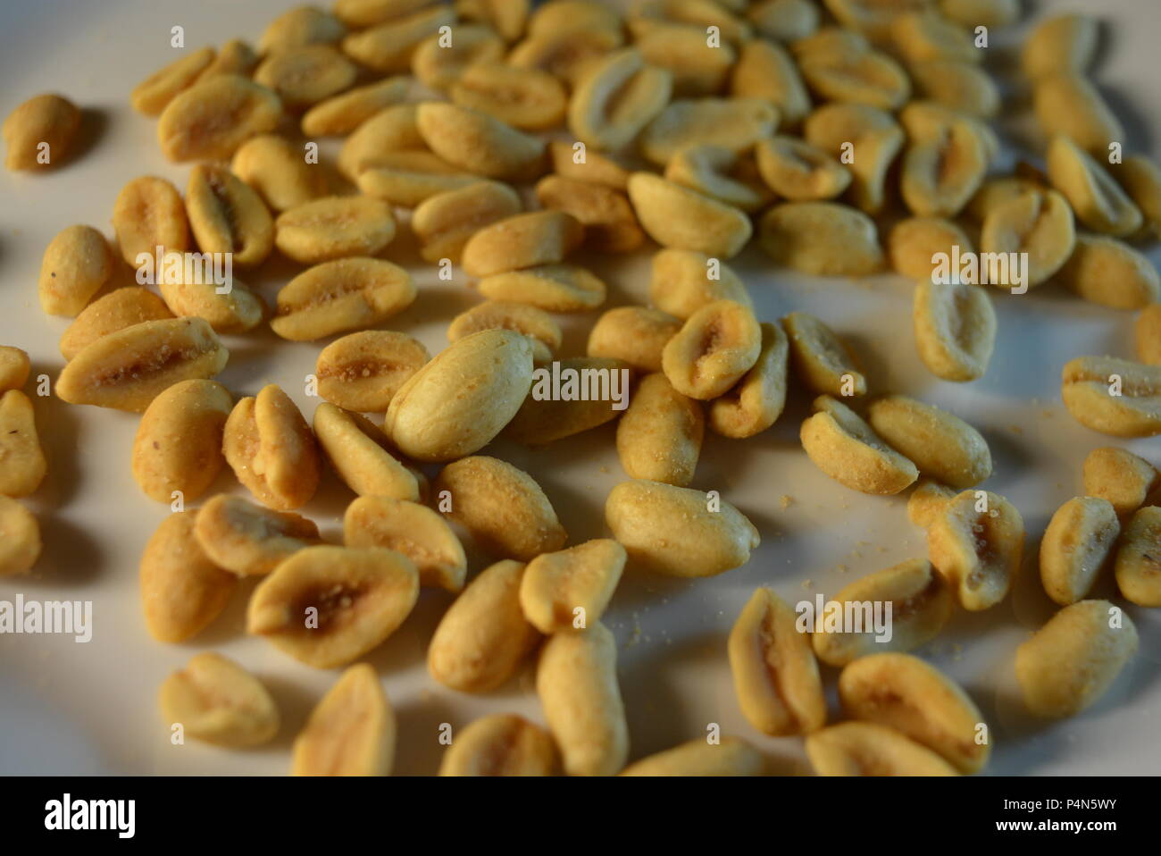 Healthy foods, health, nuts, salted toasted peanuts are arranged ...