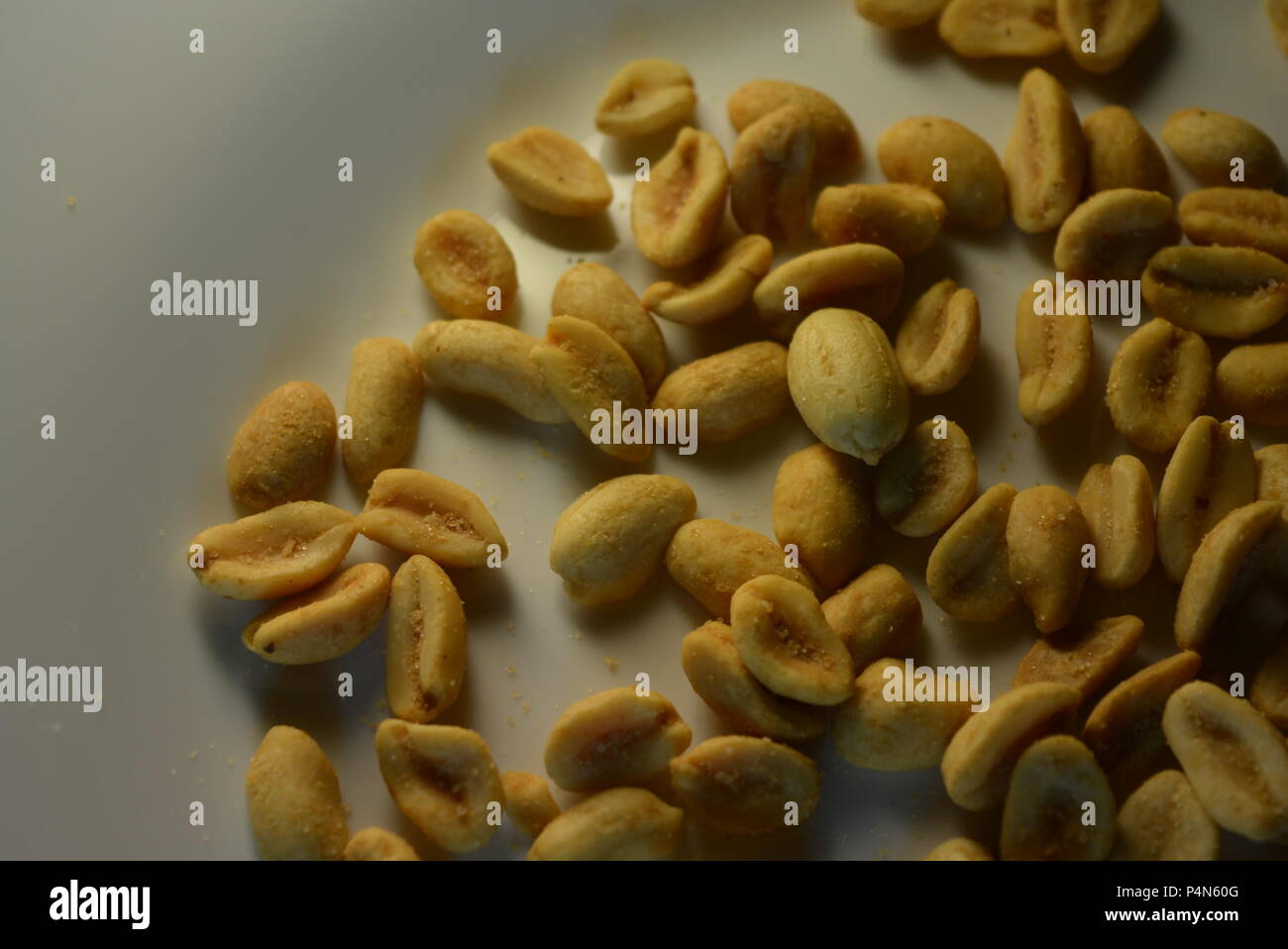 Healthy foods, health, nuts, salted toasted peanuts are arranged ...