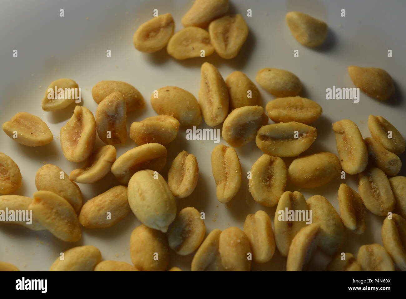 Healthy foods, health, nuts, salted toasted peanuts are arranged ...