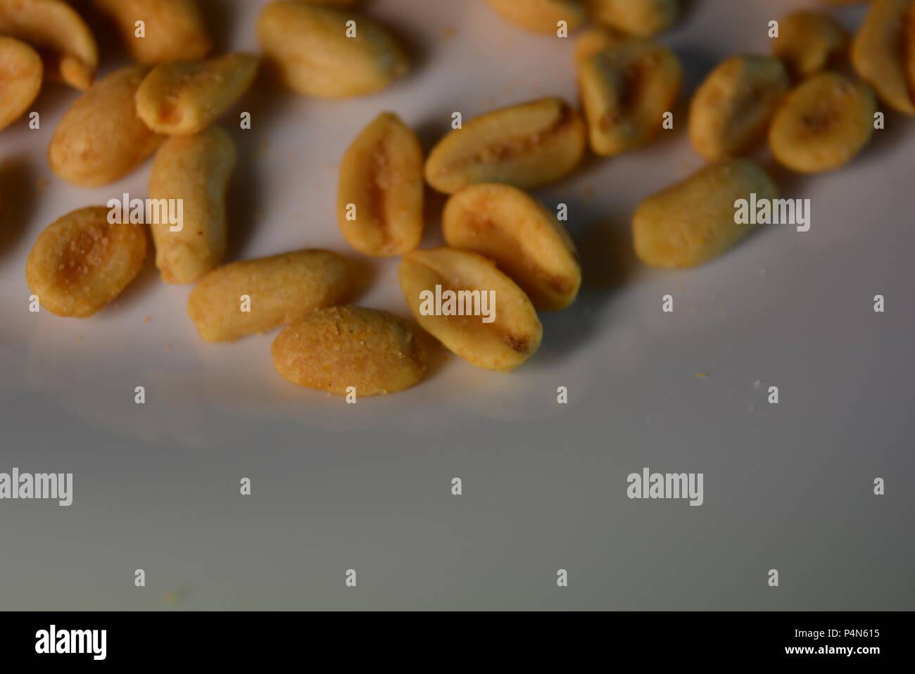 Healthy foods, health, nuts, salted toasted peanuts are arranged ...