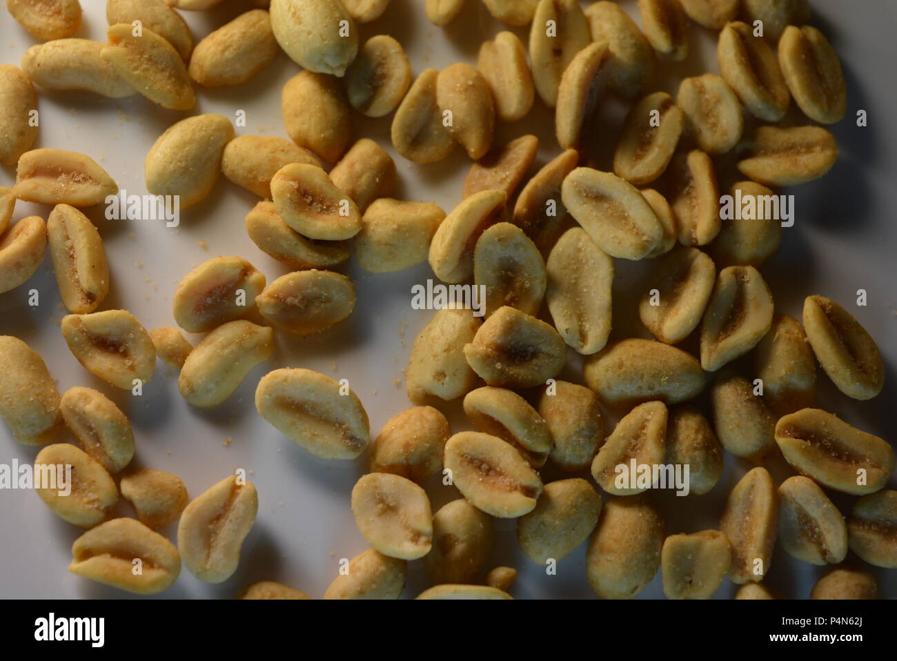 Healthy foods, health, nuts, salted toasted peanuts are arranged ...
