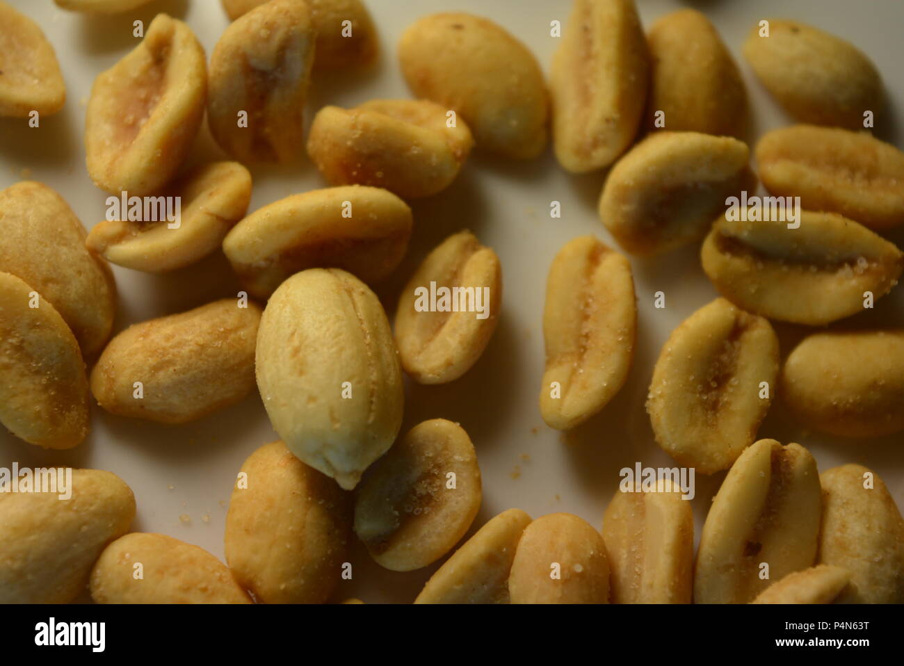 Healthy foods, health, nuts, salted toasted peanuts are arranged ...