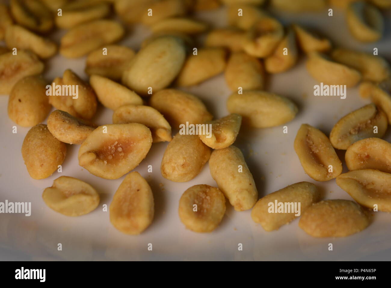 Healthy foods, health, nuts, salted toasted peanuts are arranged ...