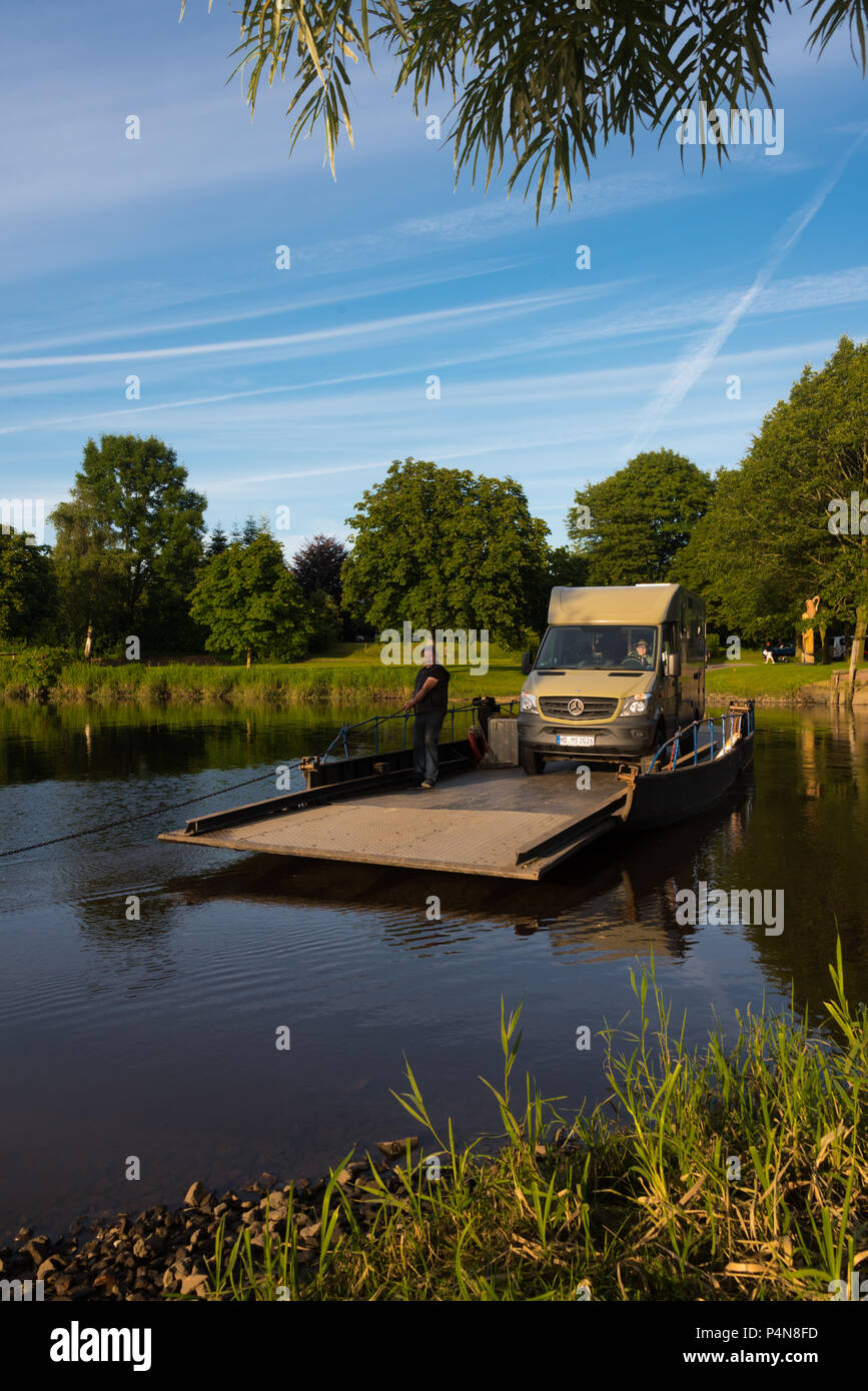 Jul. 2017, Graepel, germany, hand-operated pontoon ferry with car ior ...
