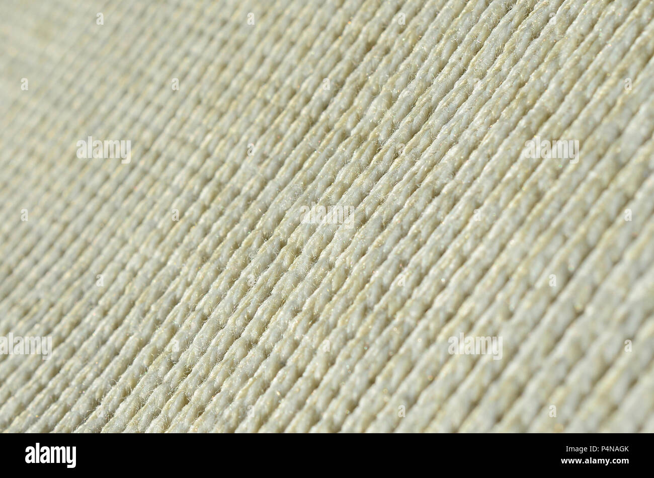 Fabric texture of a soft yellow knitted sweater. Macro image of the ...