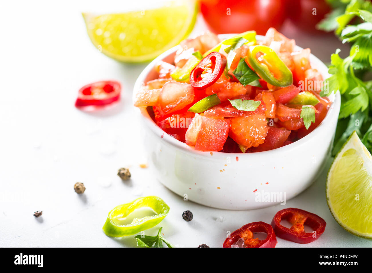 Traditional Latin American mexican salsa sauce and ingredients on white ...
