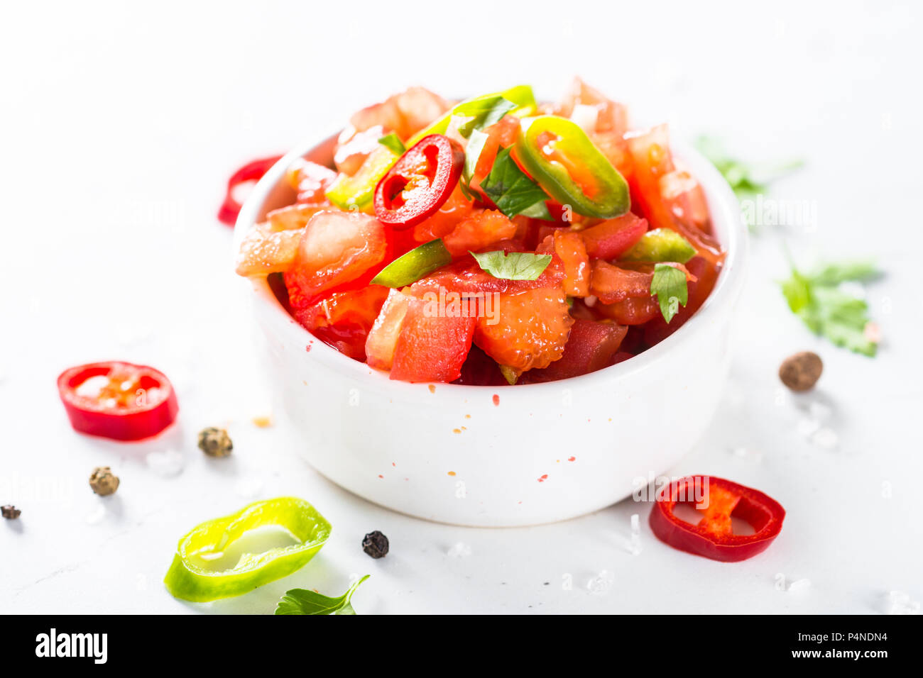 Traditional Latin American mexican salsa sauce and ingredients on white ...