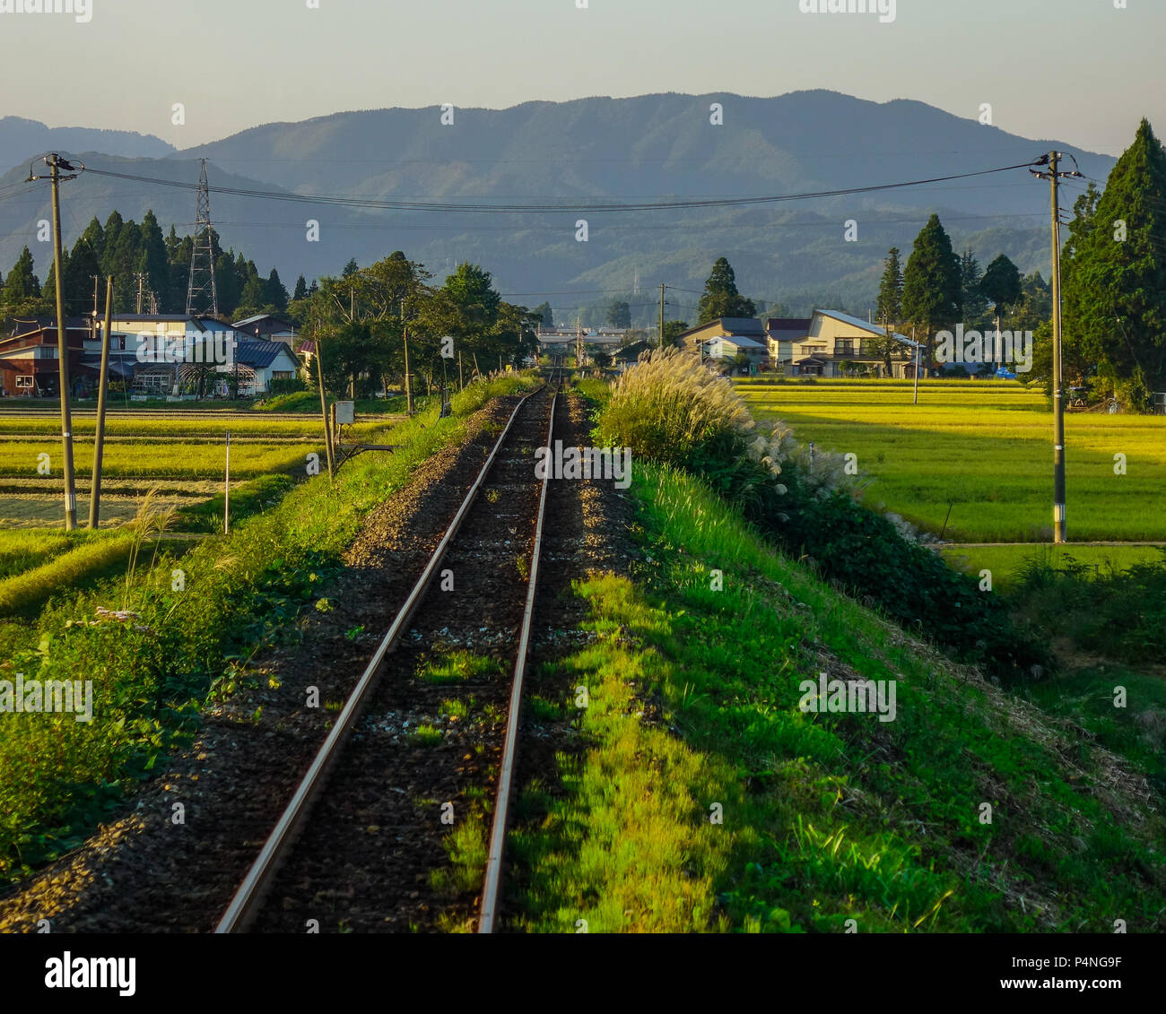 Rail track with rural scenery at summer day in Hokkaido, Japan Stock ...