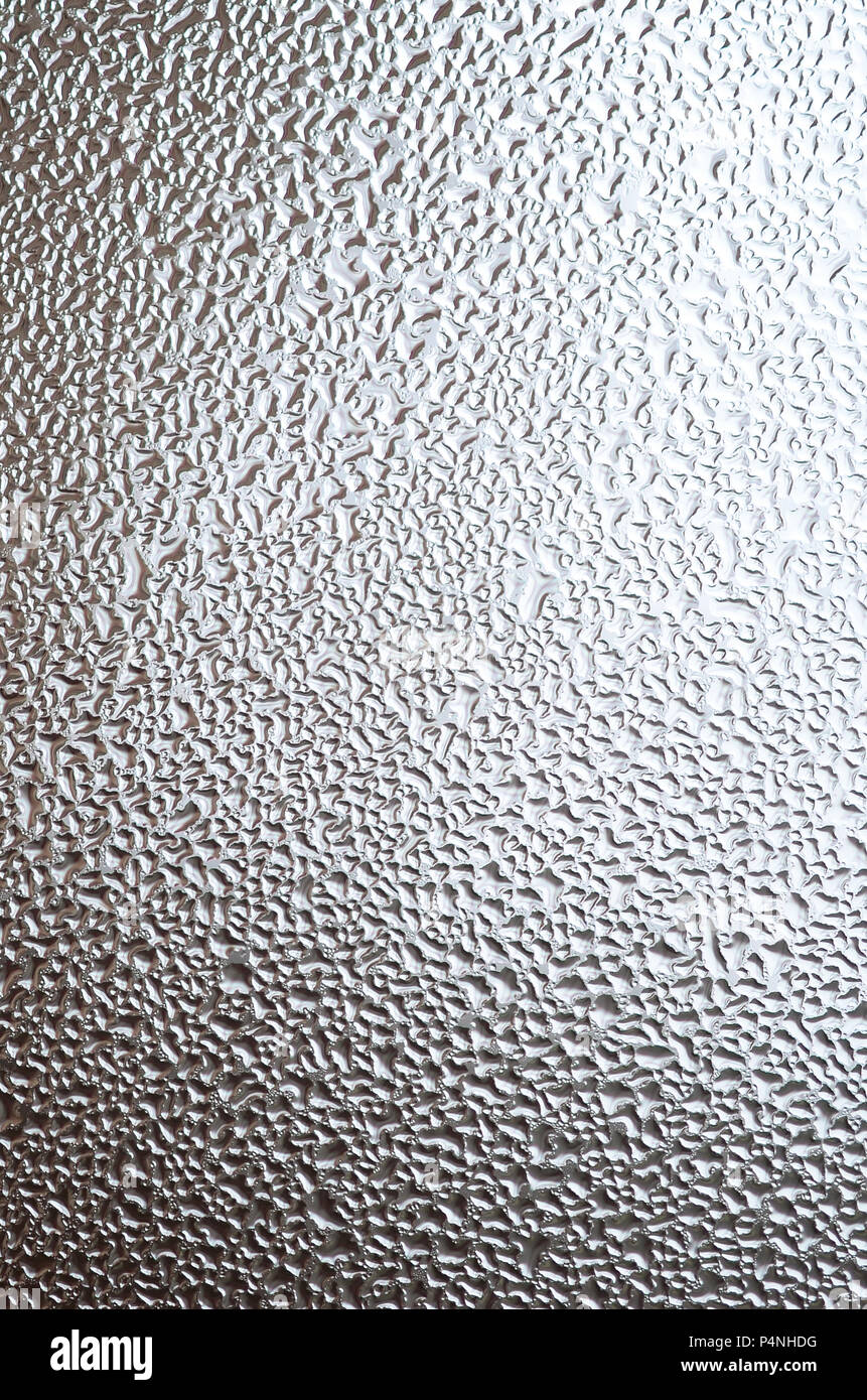 A photo of the glass surface of the window, covered with a multitude of ...