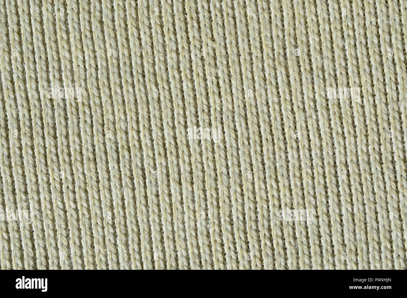 Fabric texture of a soft yellow knitted sweater. Macro image of the ...