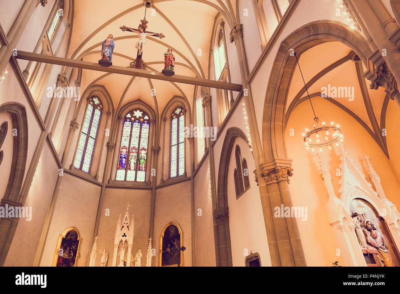 Illuminated Roman Catholic Church with Stained Glass Windows Stock ...