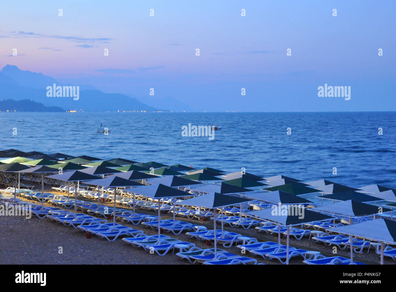 Beautiful beach with blue sea and mountains in Kemer, Turkey. Travel ...