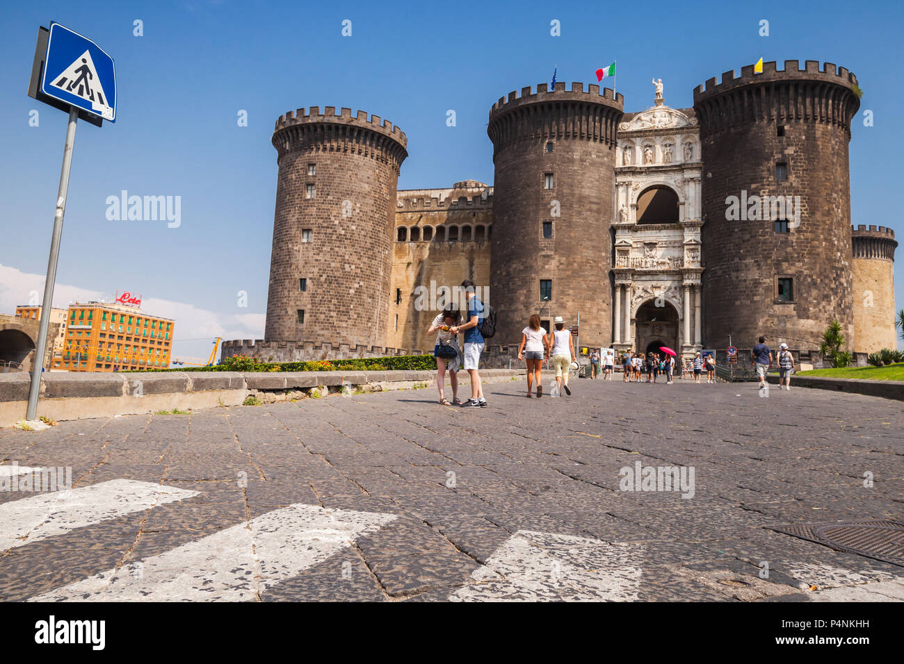 Naples, Italy - August 9, 2015: Tourists walk to Castel Nouvo. This ...