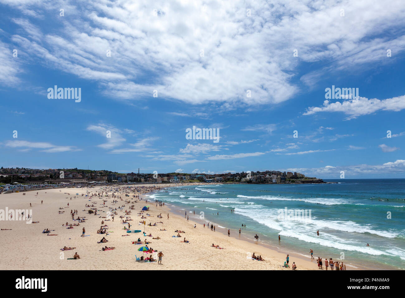 Wave breaks and surf on clear sand of famous Australian Sydney Bondi ...