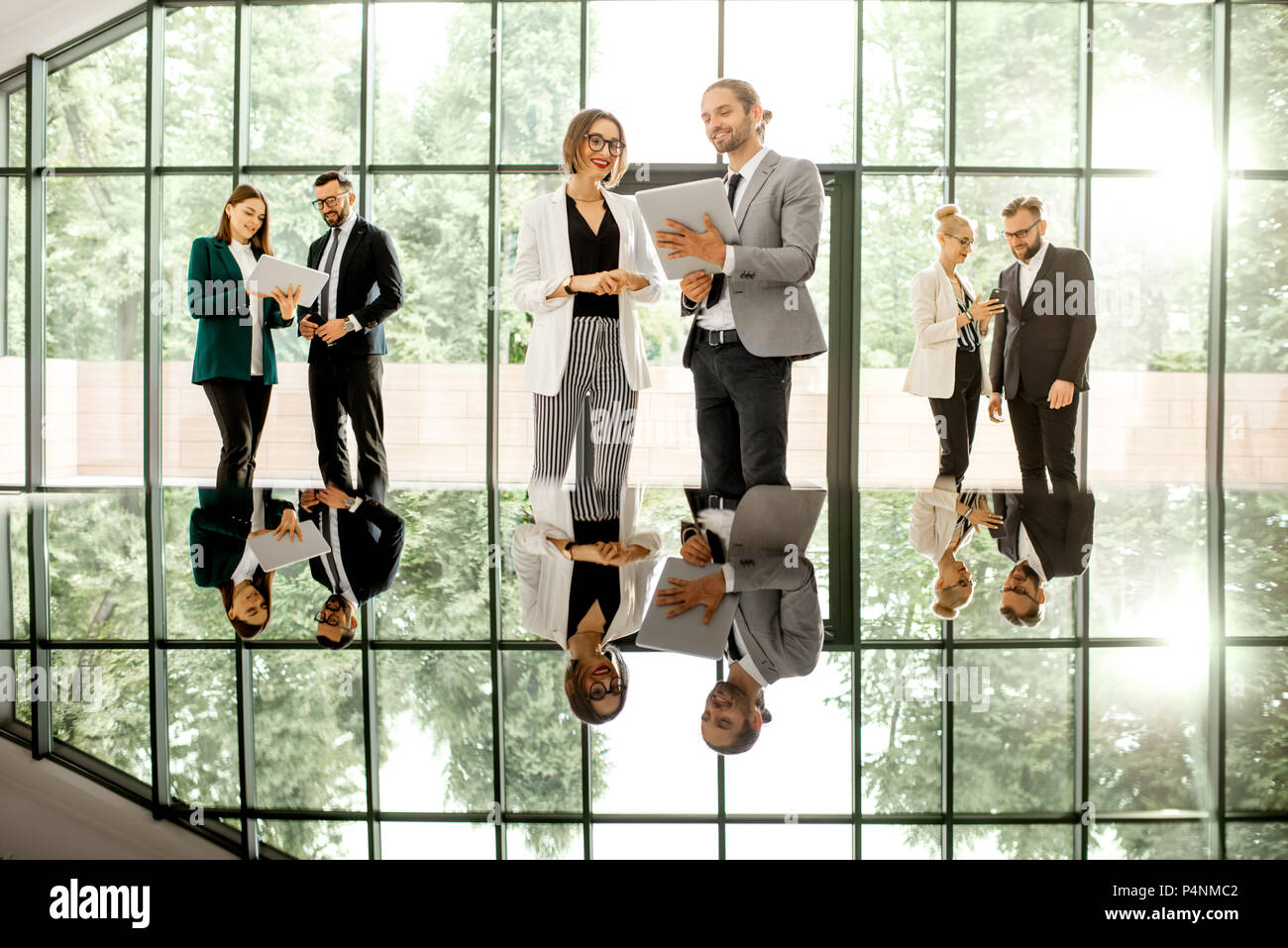 Business people at the office hall Stock Photo - Alamy