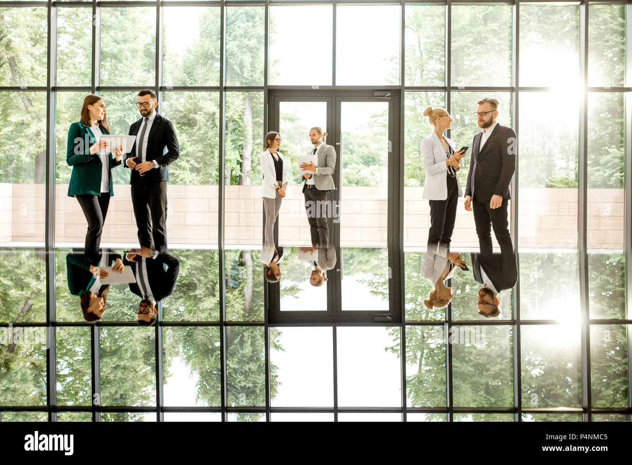 Business people at the office hall Stock Photo - Alamy