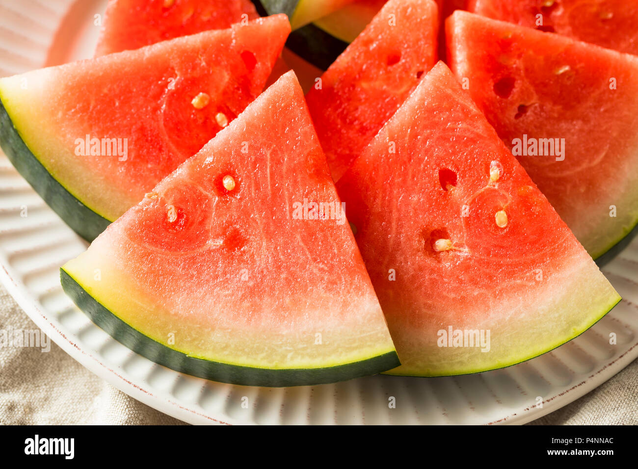 Raw Pink Organic Seedless Watermelon Slices for Summer Stock Photo - Alamy