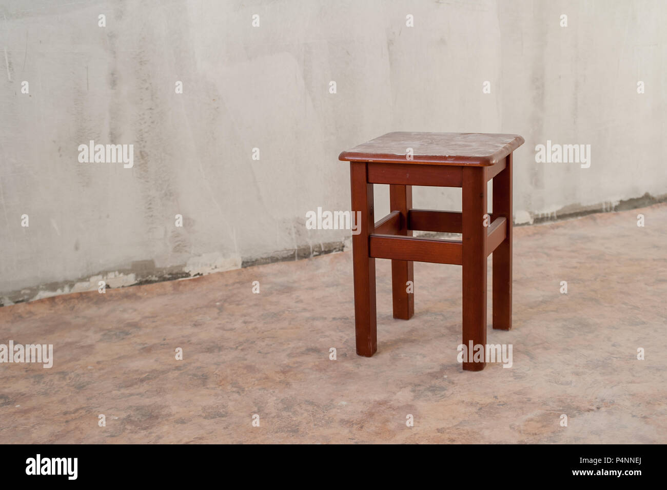 Stool in a newly built house Stock Photo - Alamy
