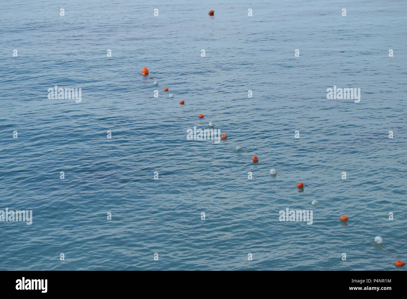 Separation buoys in the sea for safe swimming on the beach Stock Photo ...