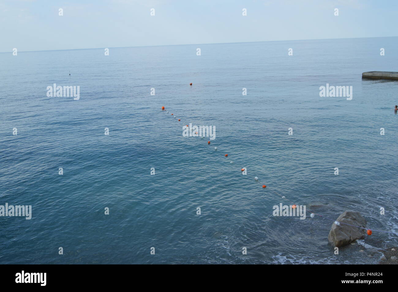 Separation buoys in the sea for safe swimming on the beach Stock Photo ...