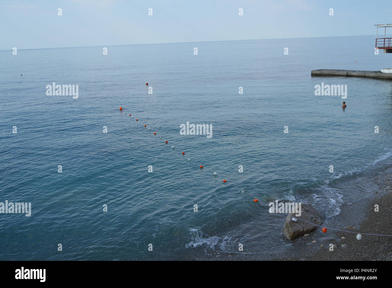 Separation buoys in the sea for safe swimming on the beach Stock Photo ...