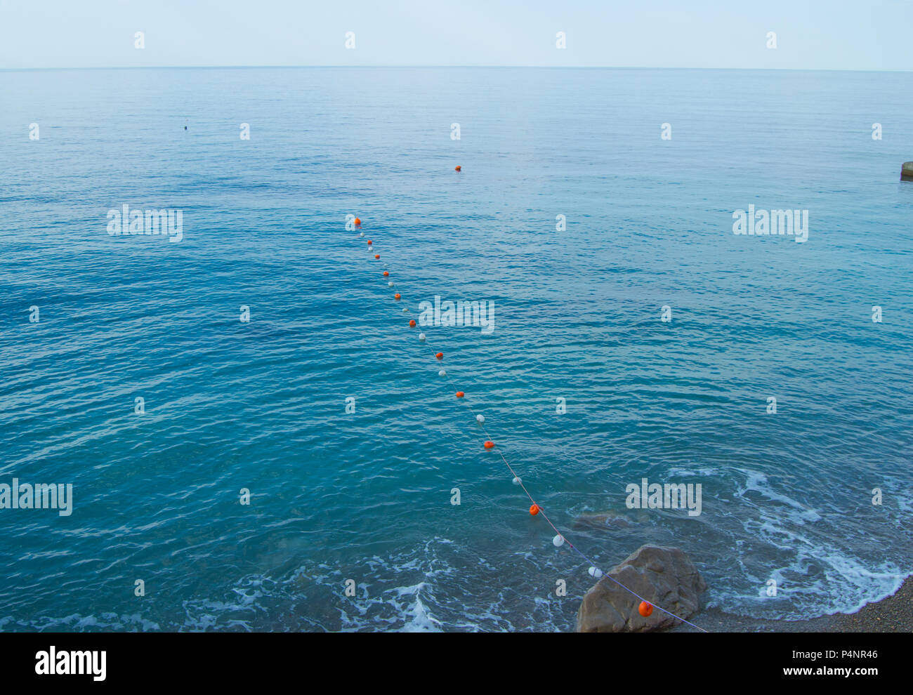 Separation buoys in the sea for safe swimming on the beach Stock Photo ...