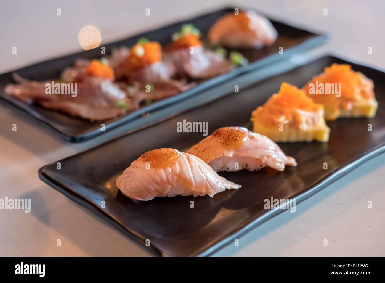 Set of grilled Wagyu beef sushi with Flying fish roe or Tobiko and ...