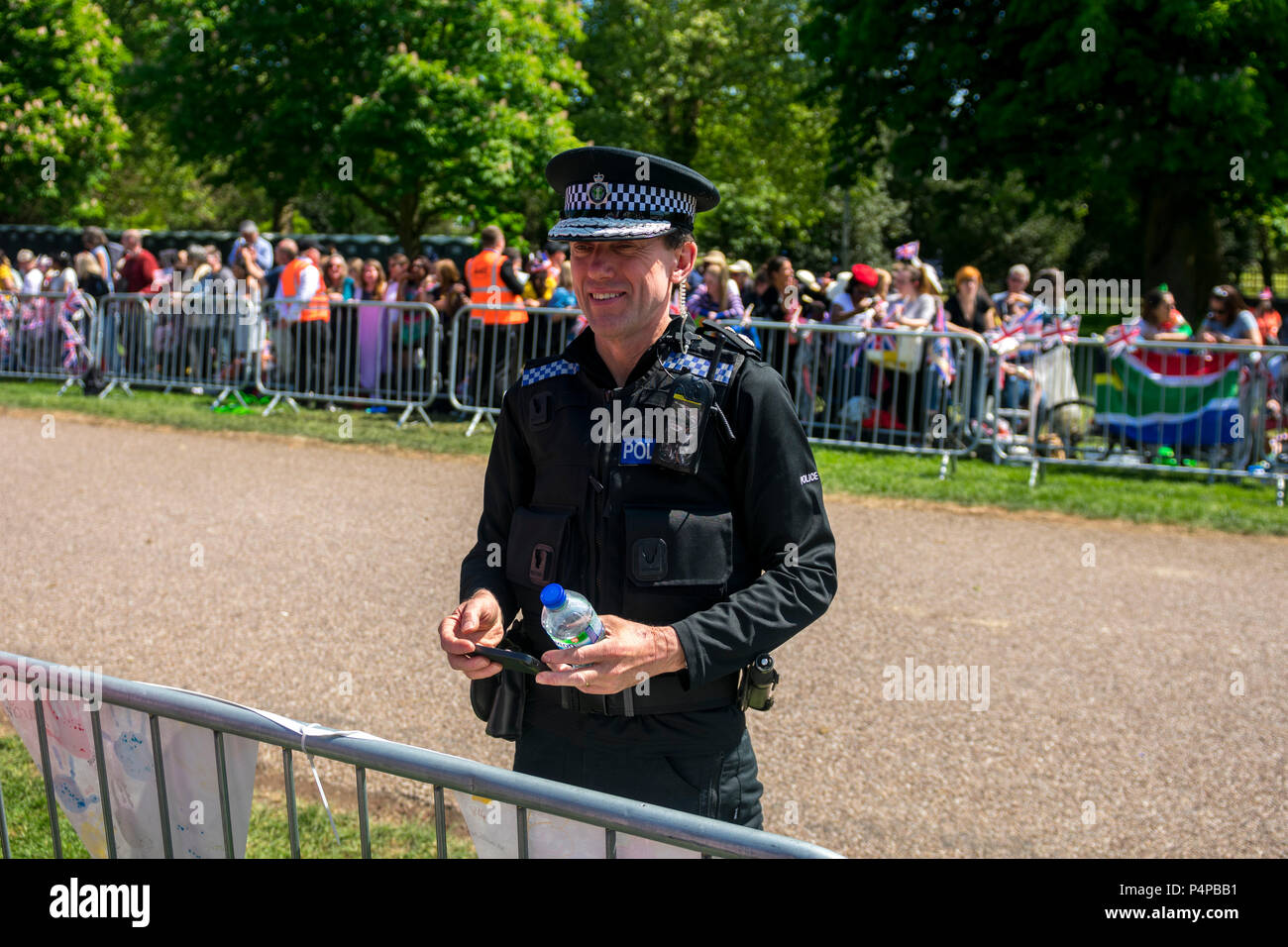 Police and armed police officers on the Long Walk on the morning of the ...