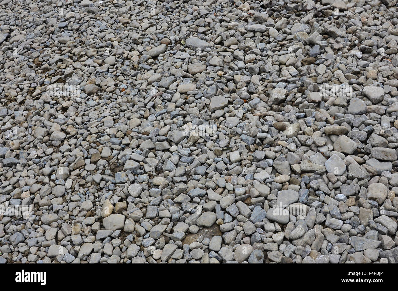 Texture of many crushed stones. Crushed stone is a solid base material ...
