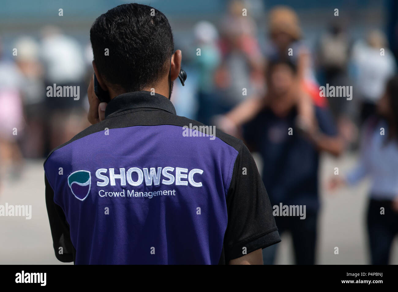 A Showsec employee seen at an event in Cardiff, Wales, UK Stock Photo ...