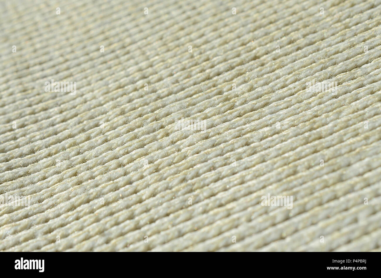 Fabric texture of a soft yellow knitted sweater. Macro image of the ...
