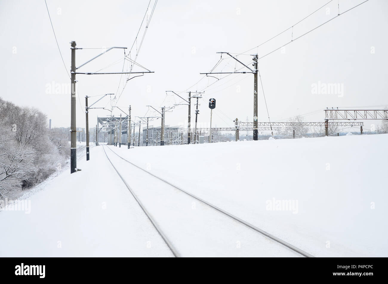 Winter railway landscape, Railway tracks in the snow-covered industrial ...
