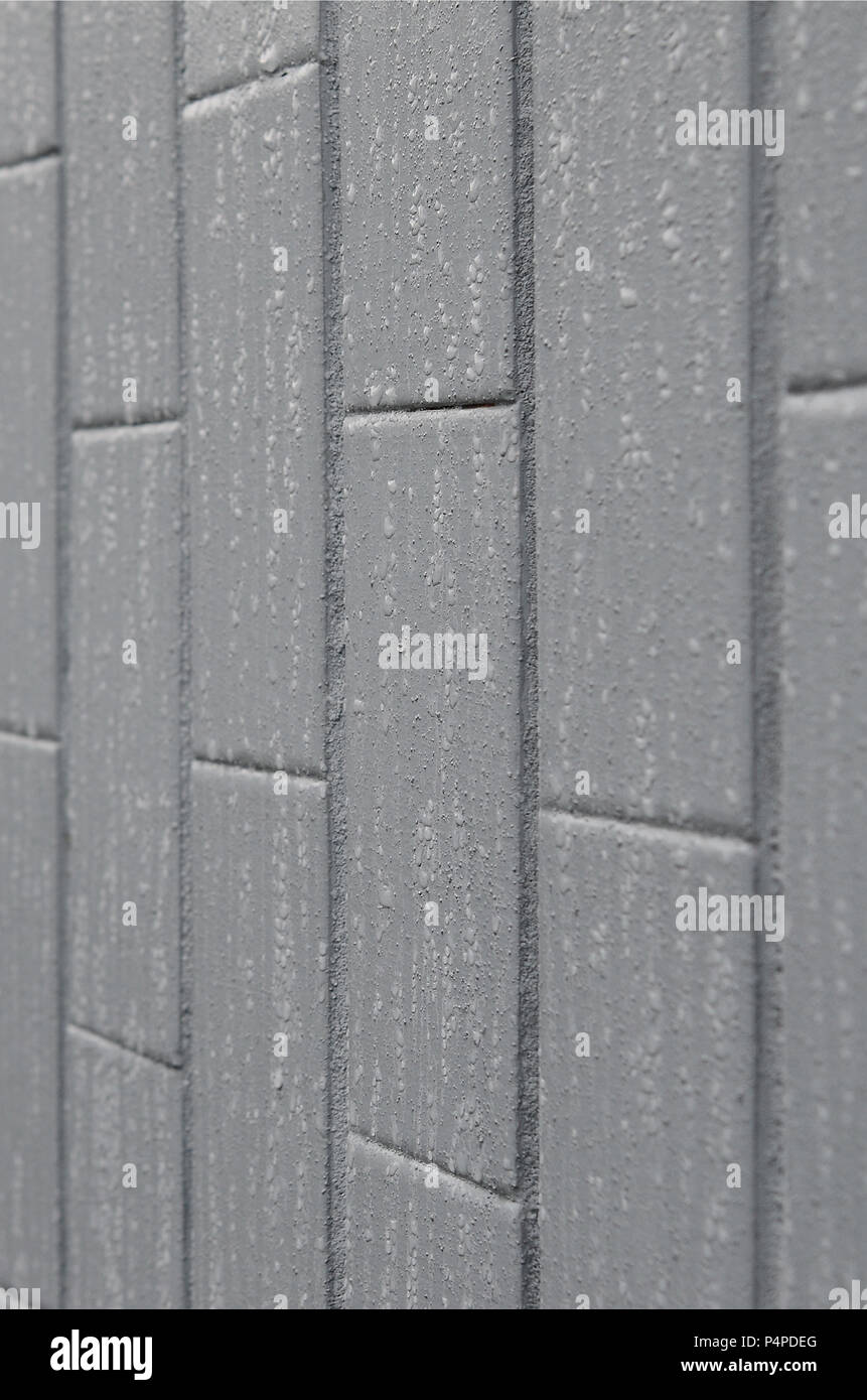 The texture of the wall from the old tile, painted gray under the ...