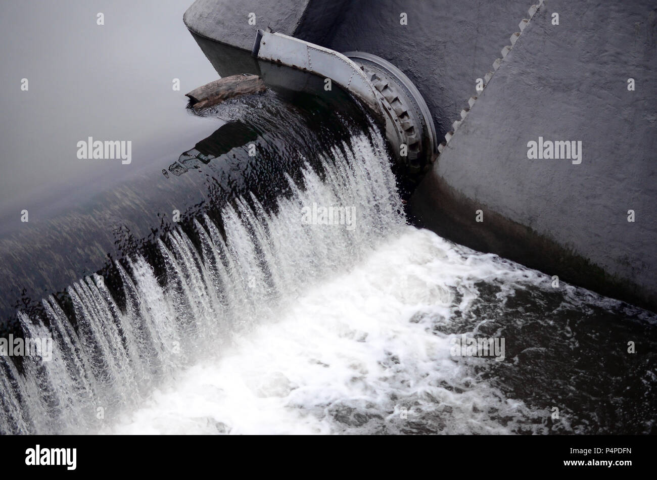 A picture of the flowing water. The dam is designed to regulate the ...