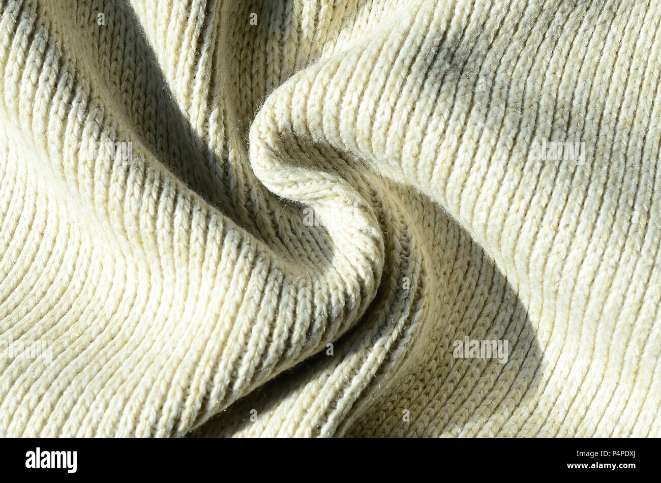 Fabric texture of a soft yellow knitted sweater. Macro image of the ...