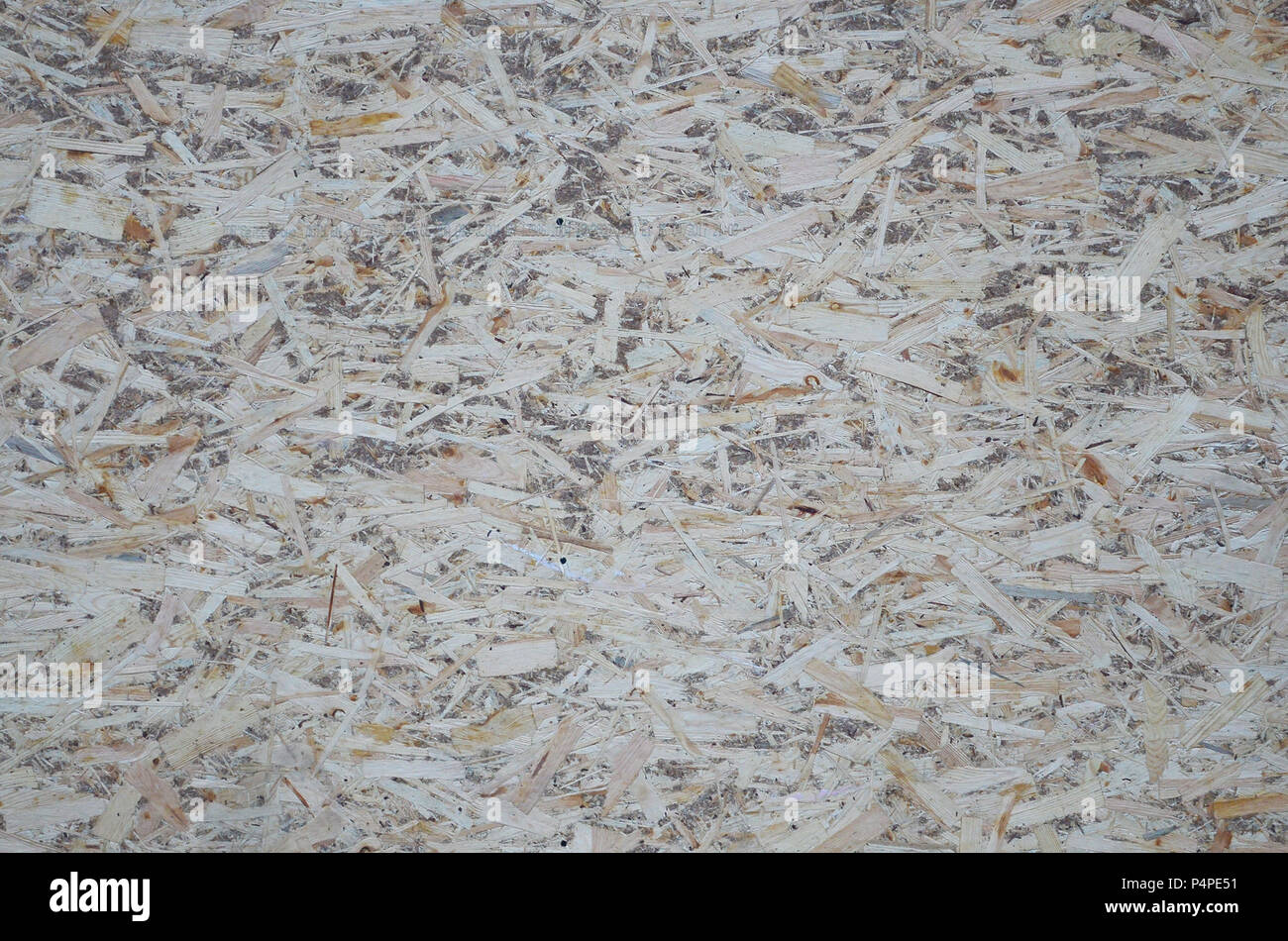 An old oriented strand board OSB , fiberboard background of texture ...