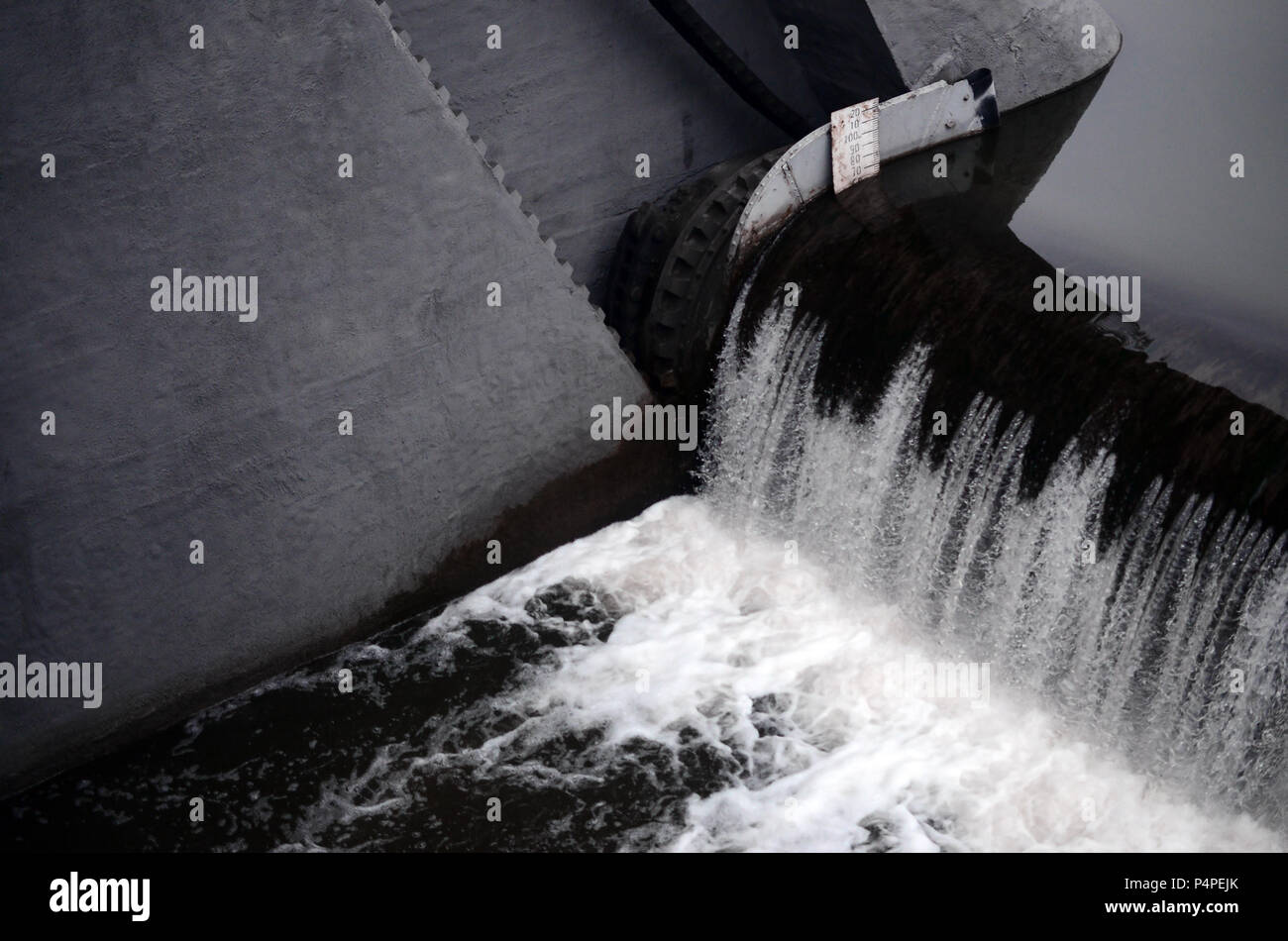 A picture of the flowing water. The dam is designed to regulate the ...