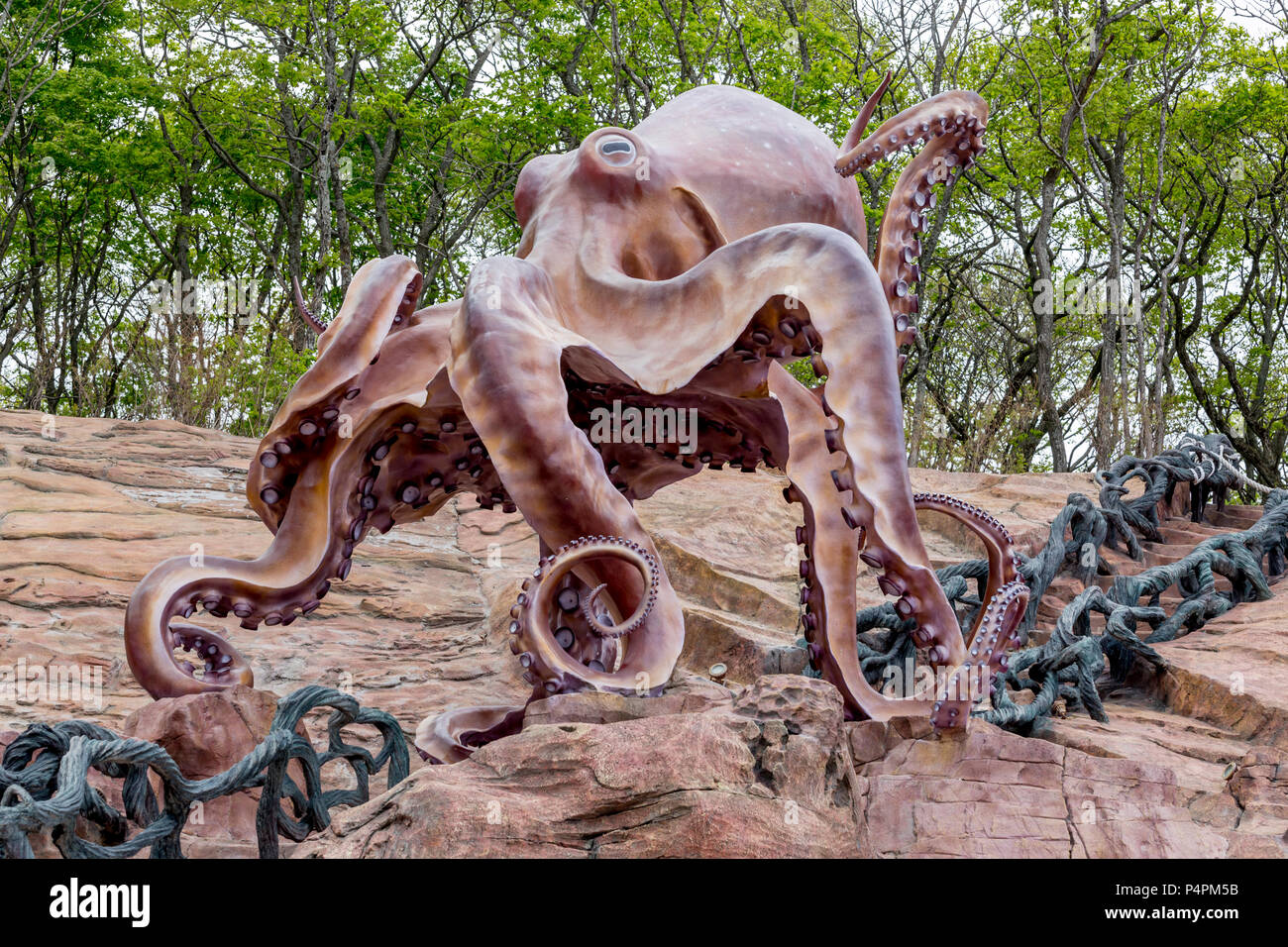 Russia, Vladivostok, 05/26/2018. Sculpture of large octopus on a rock ...