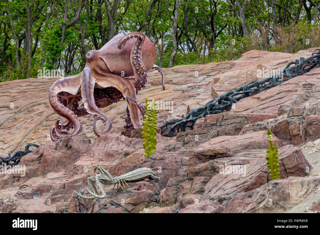 Russia, Vladivostok, 05/26/2018. Sculpture of large octopus on a rock ...