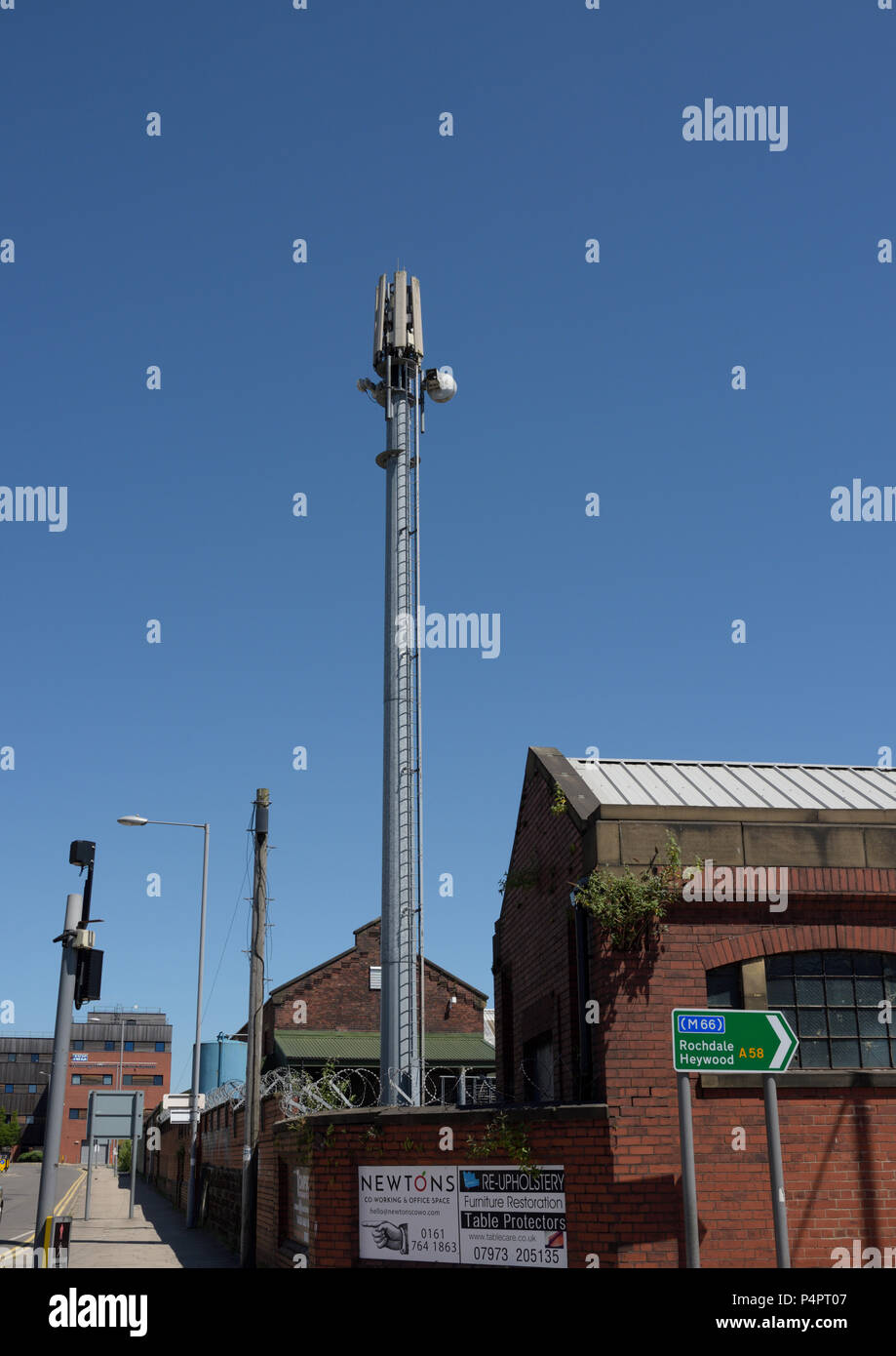 Telecommunications mast in bury lancashire uk Stock Photo - Alamy