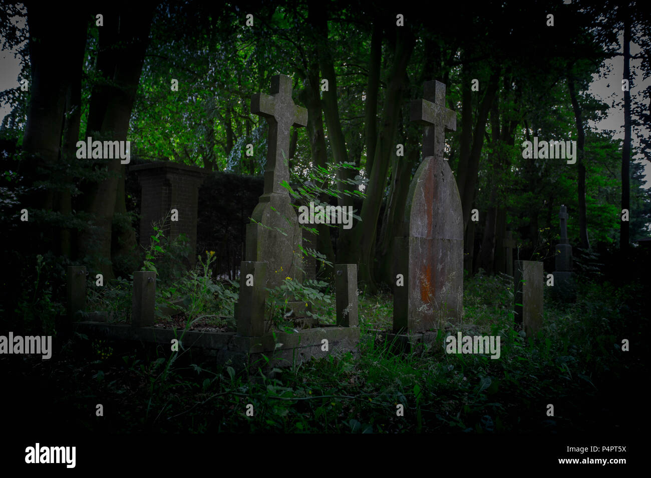 Tombstone and graves in an ancient church graveyard Stock Photo - Alamy
