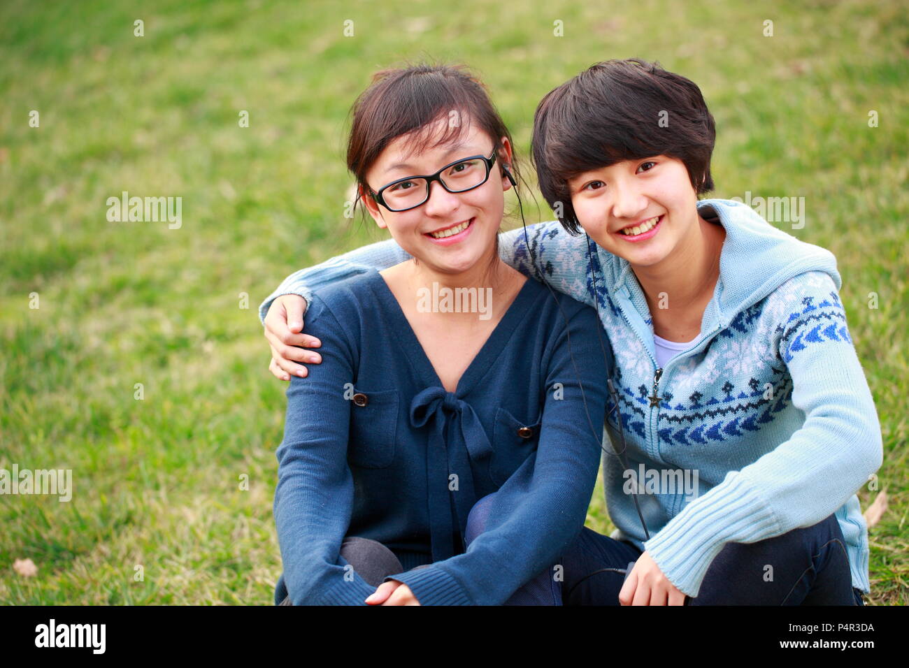 two good friends looking at camera smile Stock Photo - Alamy