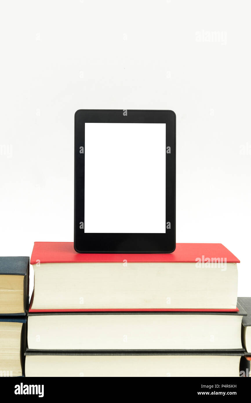 E-book device with books in white isolated background Stock Photo - Alamy