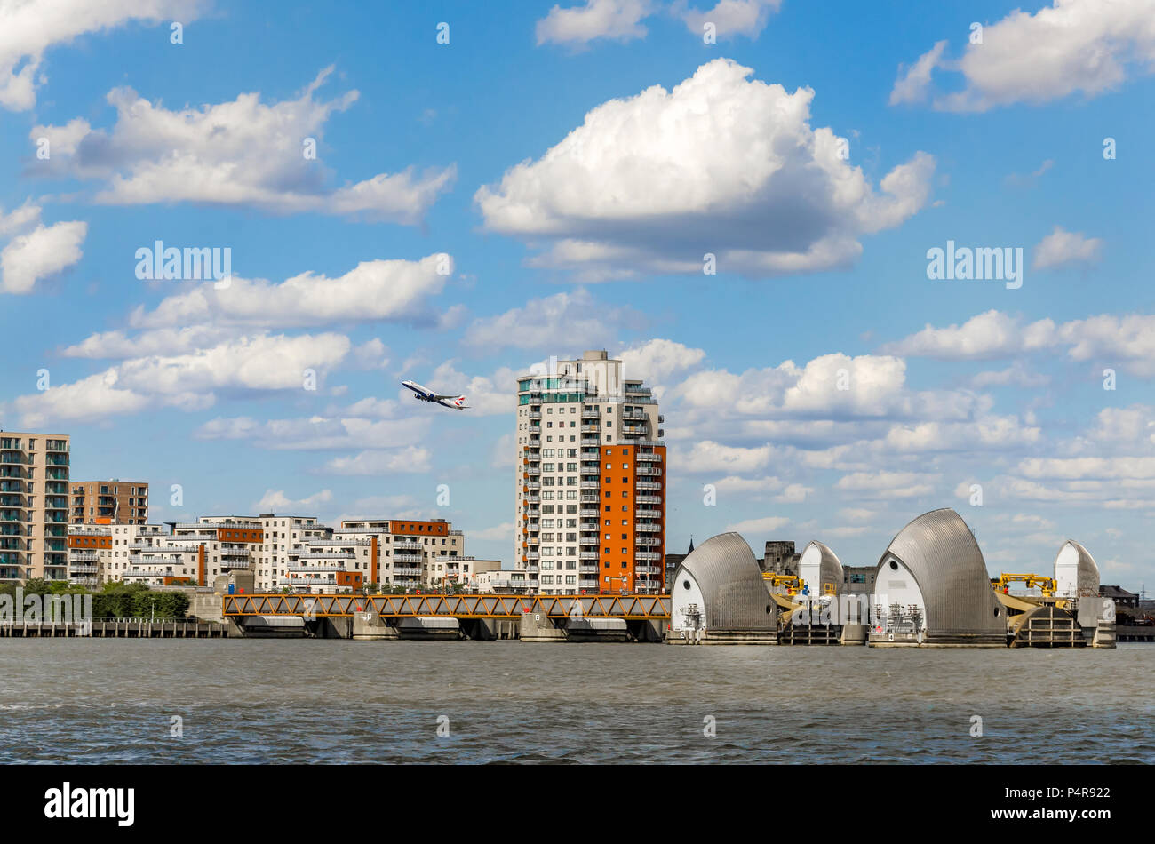 View of the Thames Barrier on a cloudy day under blue sky in London ...