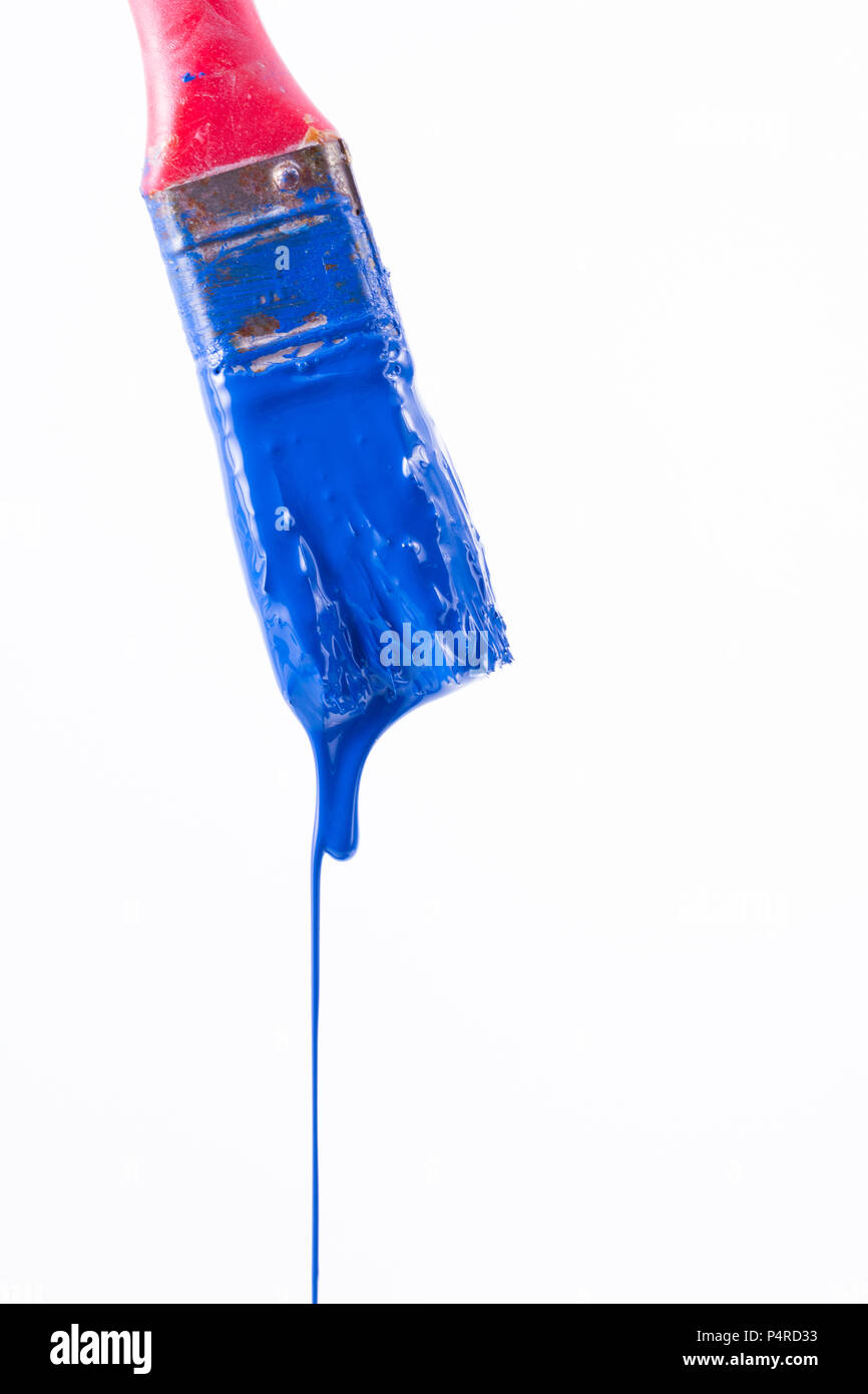paint brushes with dripping paint on white background Stock Photo - Alamy