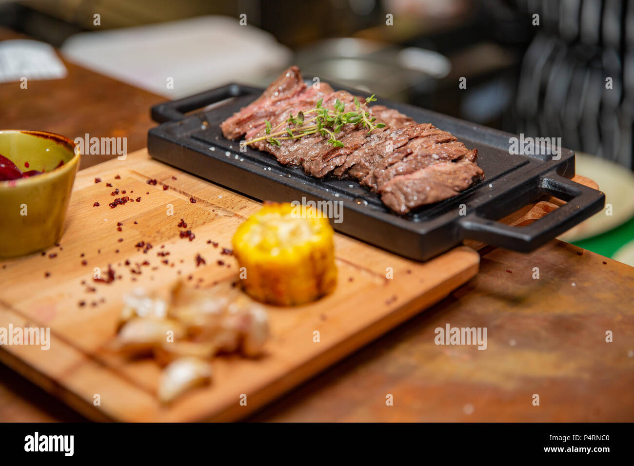 Lean over table hi-res stock photography and images - Alamy